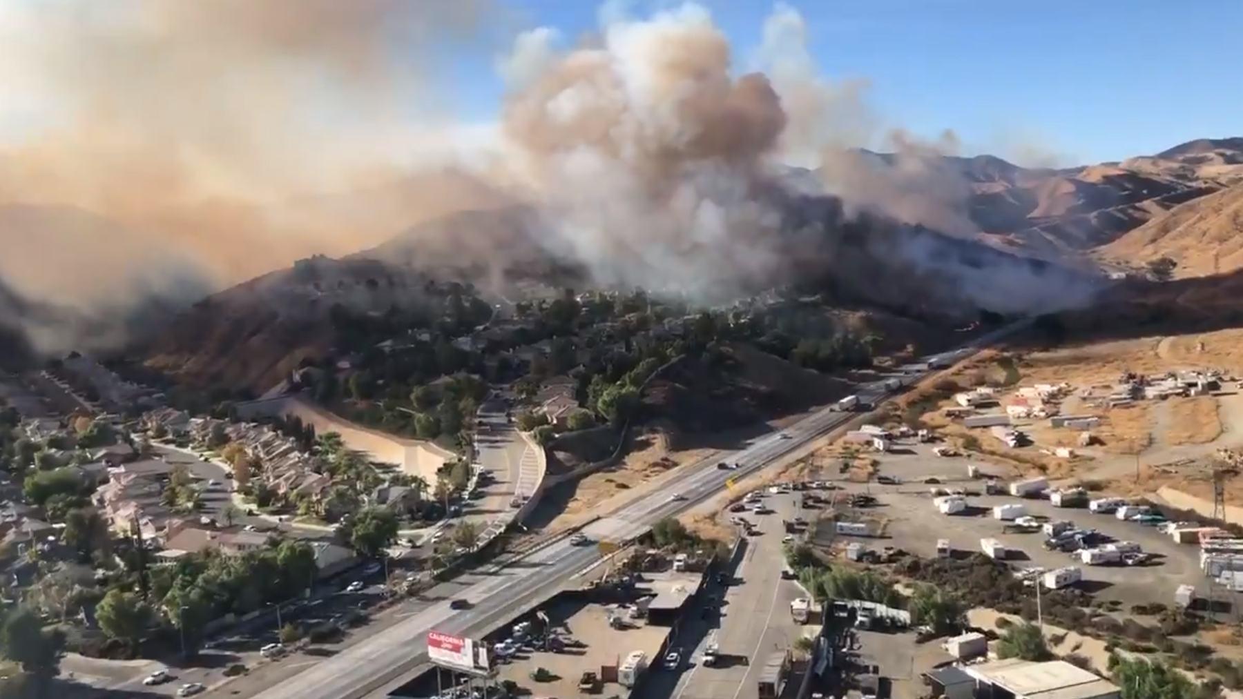 Across California, Wildfires Erupt and Power Shuts Off